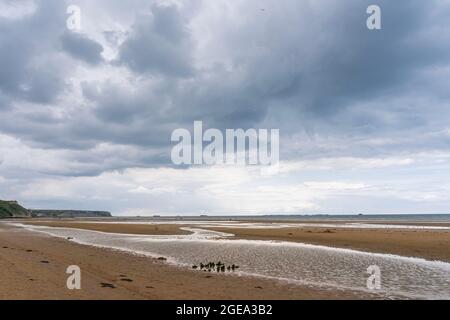 Asnelles-Sur-Mer, France - 08 04 2020: View of the sea and the pontoons ...