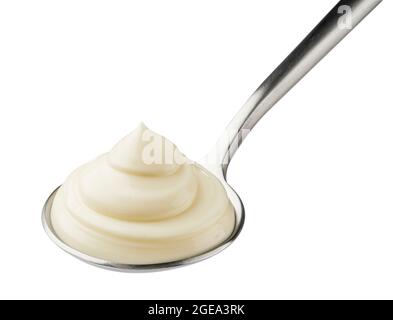 Mayonnaise in spoon isolated on white background, full depth of field ...