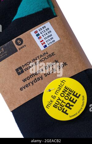 Buy 1 Get 1 Free on price tag with wooden clothes hanger top view on ...