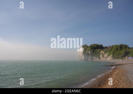 Fog rolling in from the English Channel around the cliffs at St ...