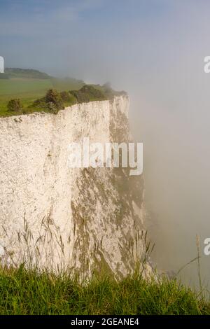 Fog rolling in from the English Channel around the cliffs at St ...