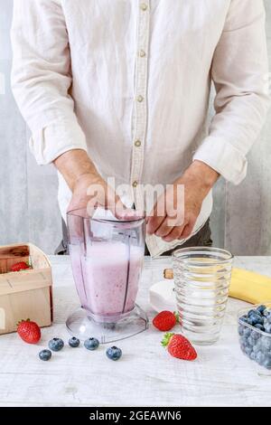 How to make fruit smoothie using blender. Step by step, tutorial Stock ...