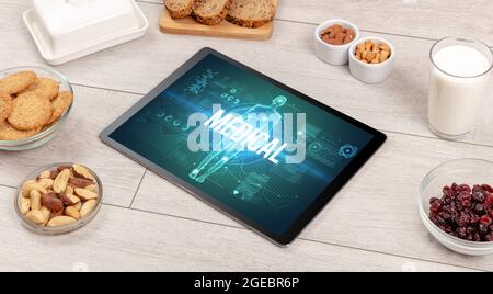 Tablet Pc with fruits, medical concept Stock Photo - Alamy