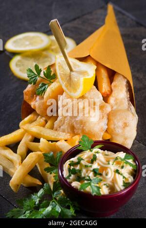 Street food, presentation of portion of cod and french fries Stock ...