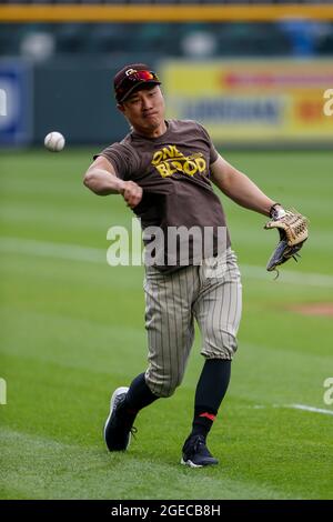 San Diego Padres' Ha-Seong Kim watches his hit in a baseball game ...