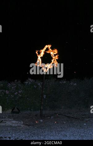 Fire display, a burning Star of David Stock Photo - Alamy
