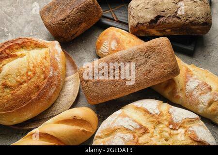 Fresh French baguette on grunge background Stock Photo - Alamy