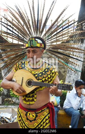 Traditional musicians, called concheros, getting ready to perform in an ...