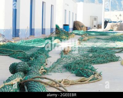 Fishing nets on the floor during the daytime Stock Photo - Alamy