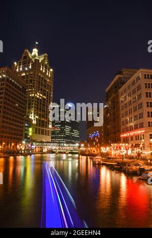 Night view of Milwaukee RiverWalk, a pedestrian pathway that meanders ...