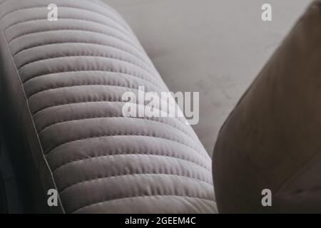 Detail shot of a gray couch in a living room Stock Photo - Alamy