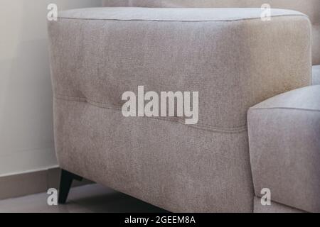 Detail shot of a greige couch in a living room Stock Photo - Alamy