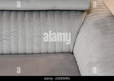 Detail shot of a gray couch in a living room Stock Photo - Alamy