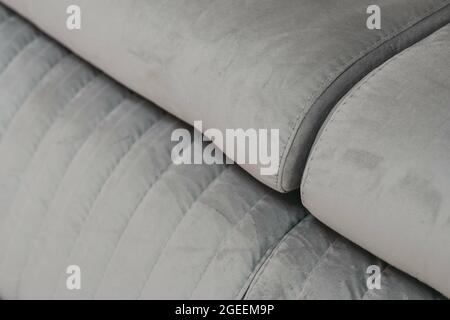 Detail shot of a gray couch in a living room Stock Photo - Alamy