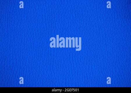 Genuine leather, artificially dyed in pale pink, close-up. Background ...