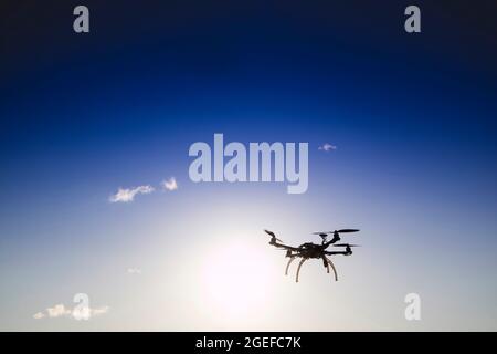 Photographic representation of the flight of a drone with cloudy sky ...