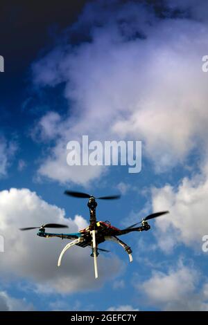 Photographic representation of the flight of a drone with cloudy sky ...