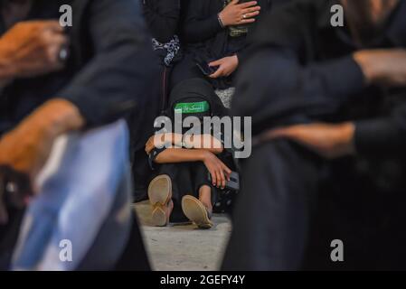 A Kashmiri Shia girl mourn inside an imam badah during the Ashura in ...