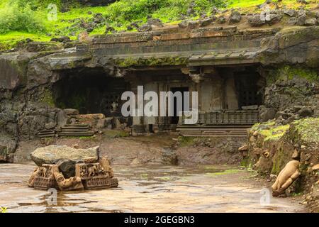 Jain Cave Temple with a beautifully carved entrance at foothills of ...