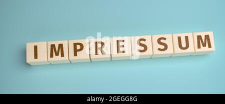 The German word Impressum built from letters on wooden cubes. High ...