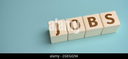 The word jobs built from letters on wooden cubes. High angle view with ...