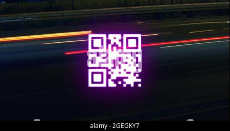 QR code scanner against light trails on black background Stock Photo ...