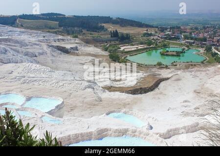 Travertines in Turkey. Calcite cliff of Pamukkale at sunny day Stock ...