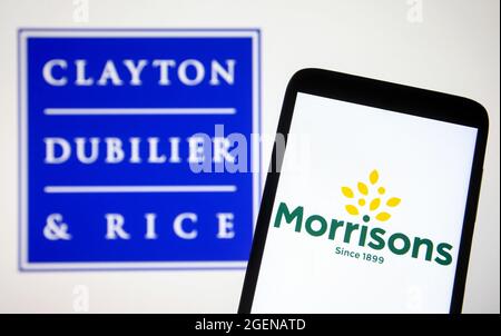 In this photo illustration, Clayton, Dubilier & Rice (CD&R) logo is ...