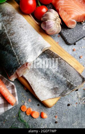 Raw fishes and vegetables on stone background, healthy food Stock Photo ...