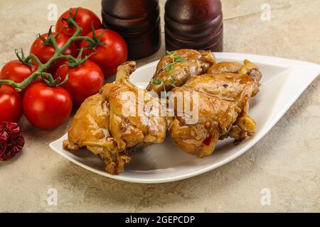 Rabbit stew in sweet and spicy sauce Stock Photo - Alamy
