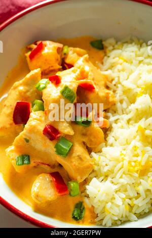 curry chicken and rice in a take away plastic packet on table Stock ...