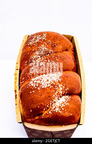 Closeup shot of a Cozonac sweet bread isolated on a white background ...