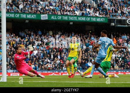 Raheem Sterling of Manchester City scores the first goal during the ...