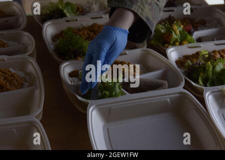 U.S. Air Force Airmen from the 379th Air Expeditionary Wing insert a ...