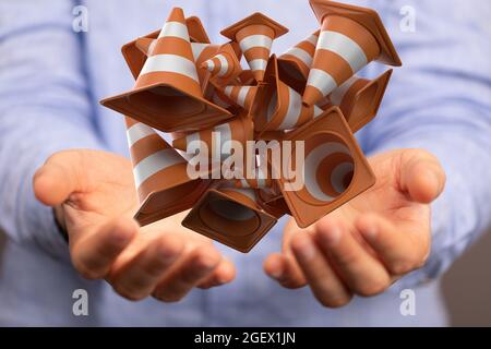 3D rendered traffic cones held in person's hand Stock Photo - Alamy