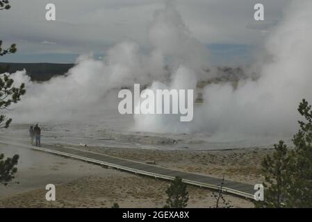 Visitors viewing Fountain Geyser ; Date: 19 September 2003 Stock Photo ...