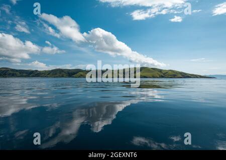 View of green-capped mountains of Padar island Stock Photo - Alamy