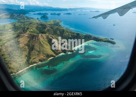 View of Komodo island from the airplane window Stock Photo - Alamy