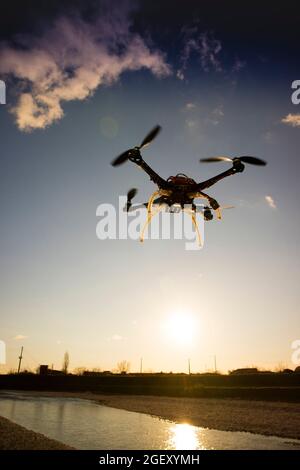 Photographic representation of the flight of a drone at sunset Stock ...