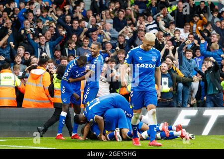 Leeds, UK. 21st Aug, 2021. Demarai Gray #11 of Everton celebrates his ...