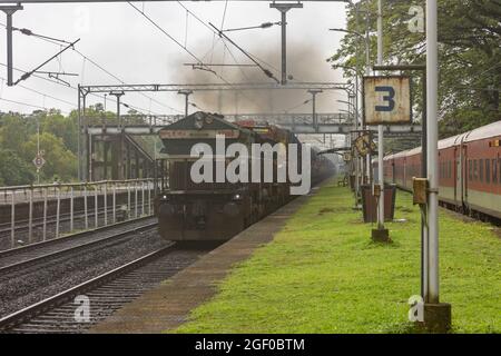Ro-Ro (Roll On Roll Off) train carrying trucks crossing at Sawantwadi ...