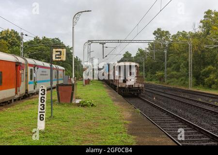 Ro-Ro (Roll On Roll Off) train carrying trucks crossing at Sawantwadi ...