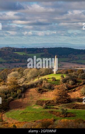 An autumn view of Eastnor castle Obelisk in the Malvern Hills, England ...