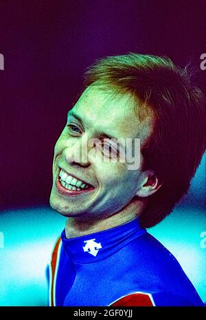 U.S. figure skater Scott Hamilton of Denver, Colorado, carries a U.S ...