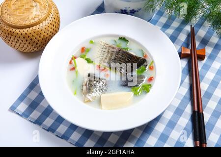 Bean curd soup crucian carp Stock Photo - Alamy