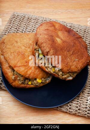 Traditional South African Vetkoek and mince Stock Photo - Alamy