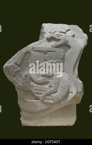 Quetzalcoatl (feathered serpent) head sculpture carving in its temple ...