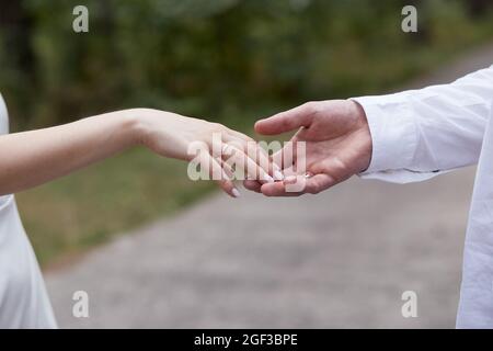 Photo of young couple fingers touch chin guess look empty space plan ...