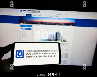 Smartphone with website of company China Orient Asset Management Co ...