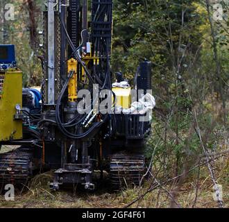 Self-propelled Mini drill rig drills soil for soil investigation. Test ...